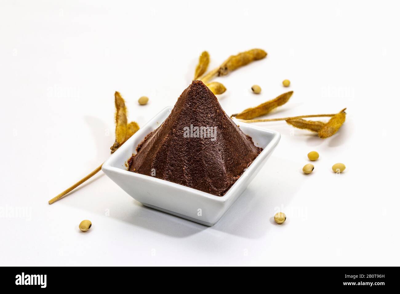 Dark brown miso paste isolated on white background. Traditional ...