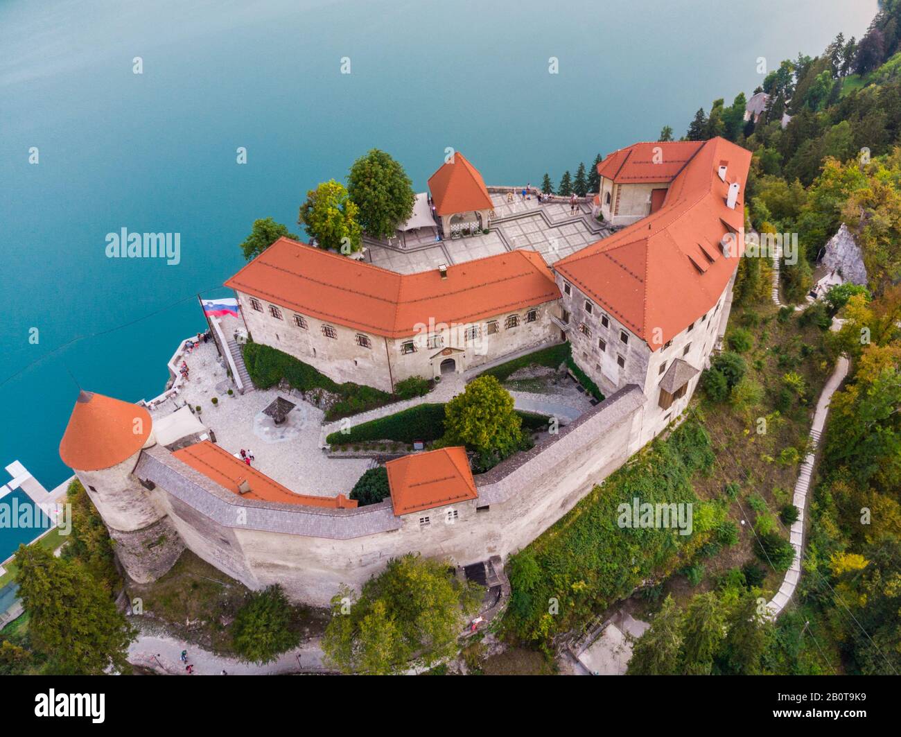 Aerial view of Bled Castle overlooking Lake Bled in Slovenia, Europe ...