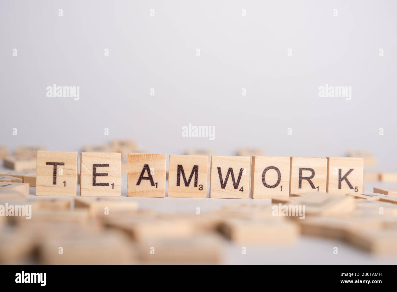 TEAMWORK wooden tile font concept Stock Photo - Alamy