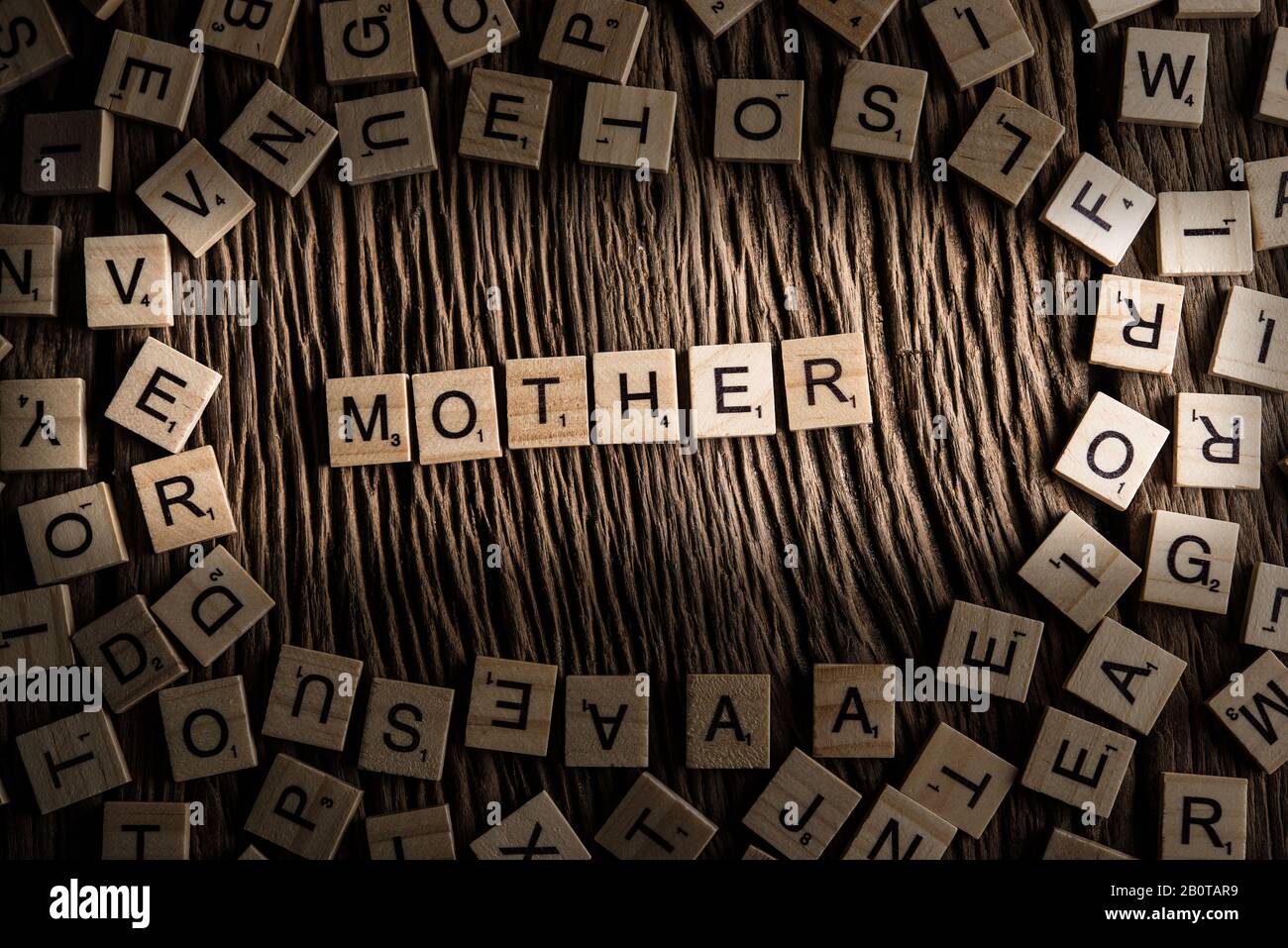 MOTHER wooden tile font concept Stock Photo - Alamy