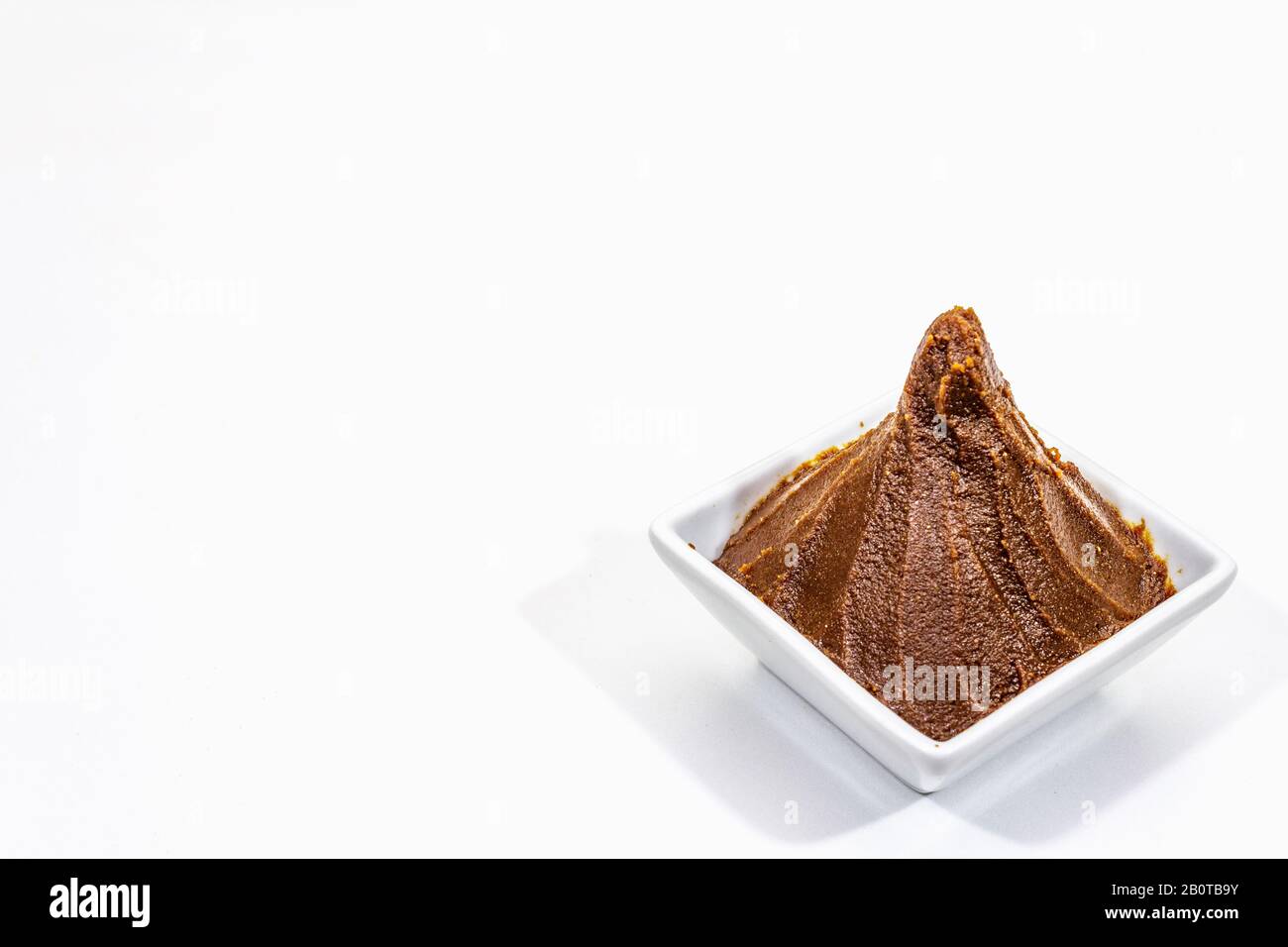 Light brown miso paste isolated on white background. Traditional ...
