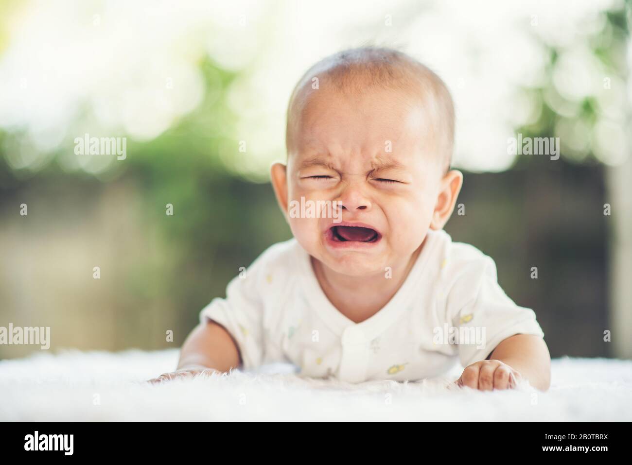 Baby boy crying. Sad child portrait Stock Photo - Alamy