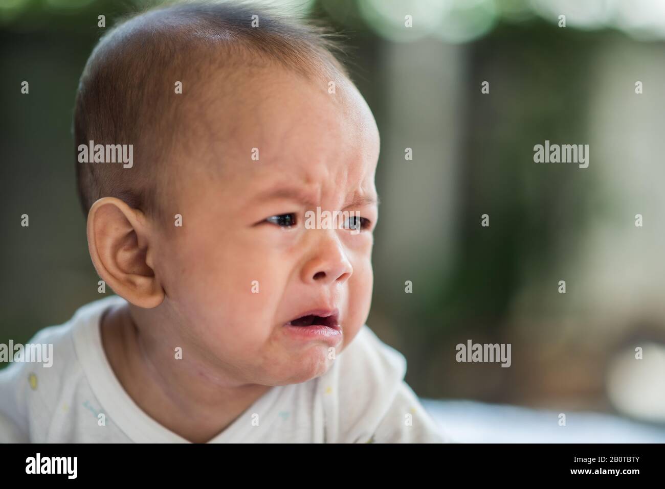 Baby boy crying. Sad child portrait Stock Photo - Alamy