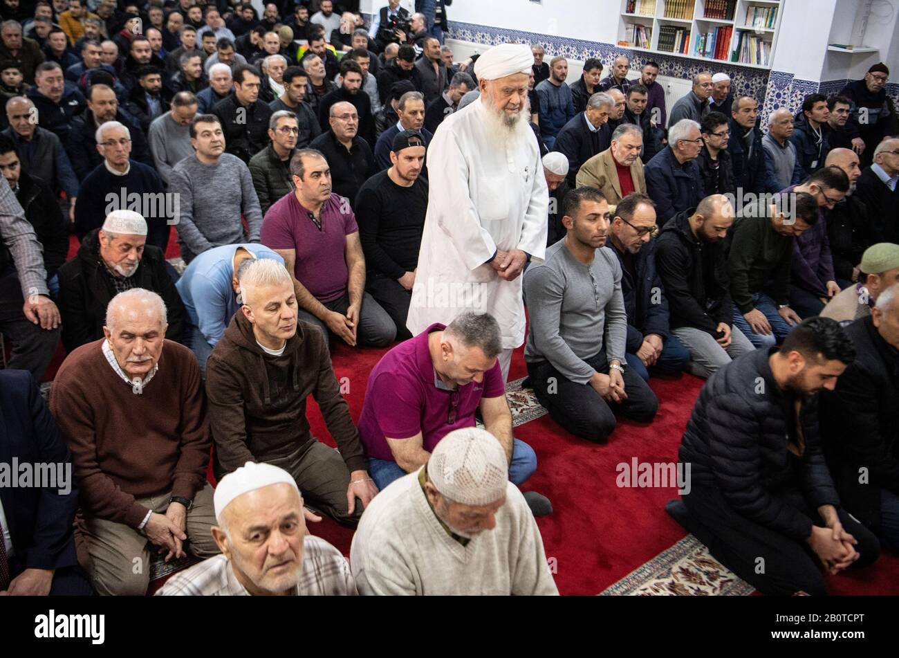Hanau, Germany. 21st Feb, 2020. Men pray in a Turkish mosque in ...