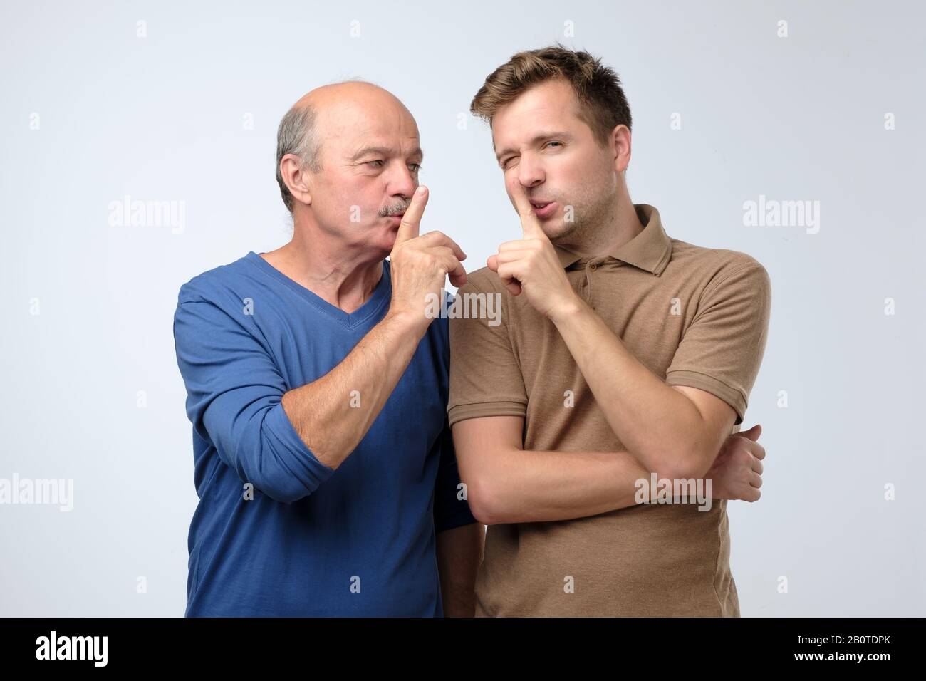 Two sad looking men hi-res stock photography and images - Alamy