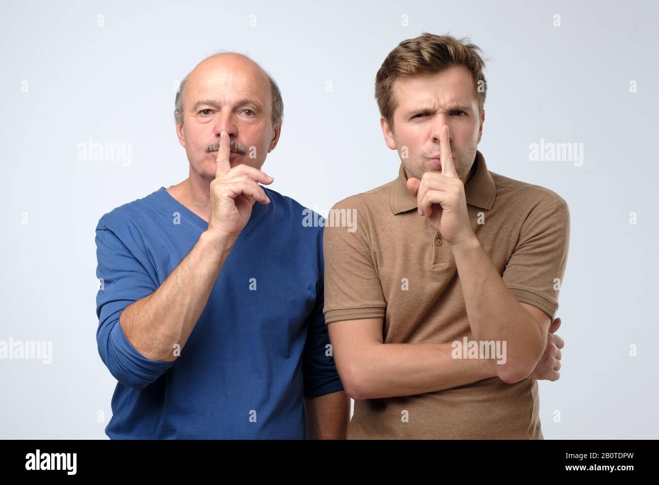 Two sad looking men hi-res stock photography and images - Alamy