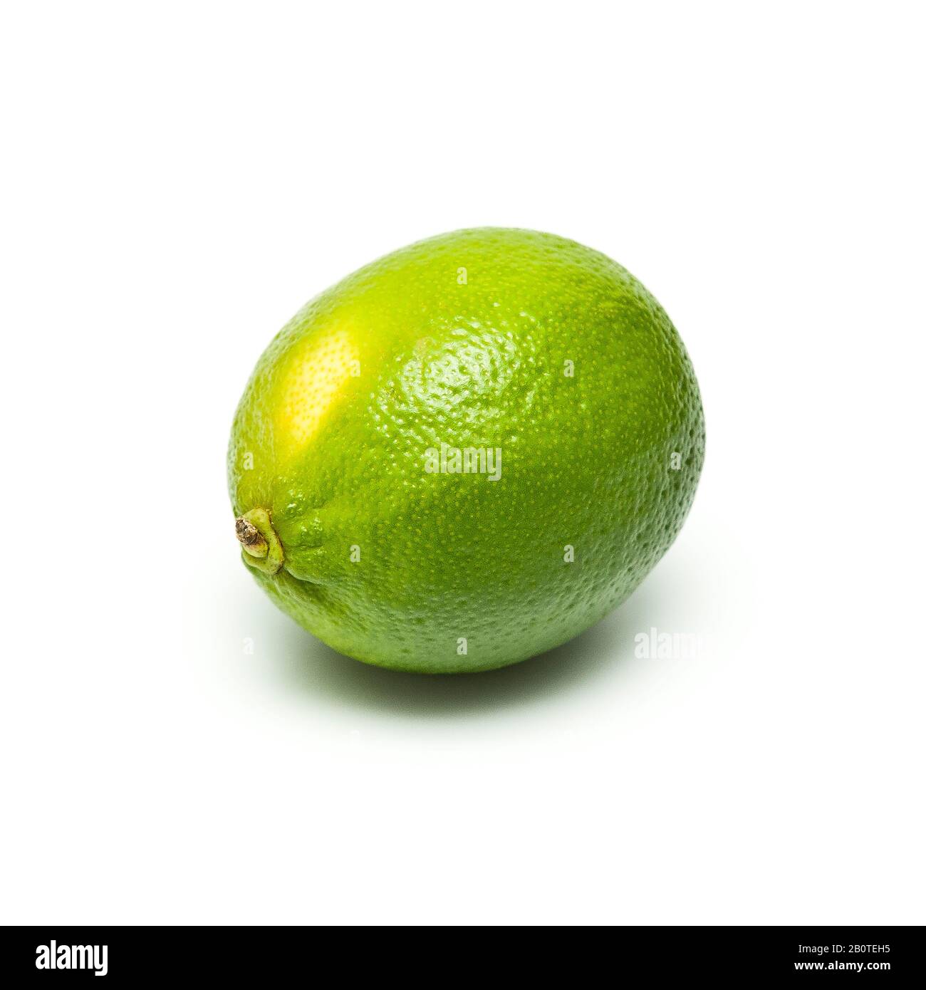 Fresh lime isolated on white Stock Photo - Alamy