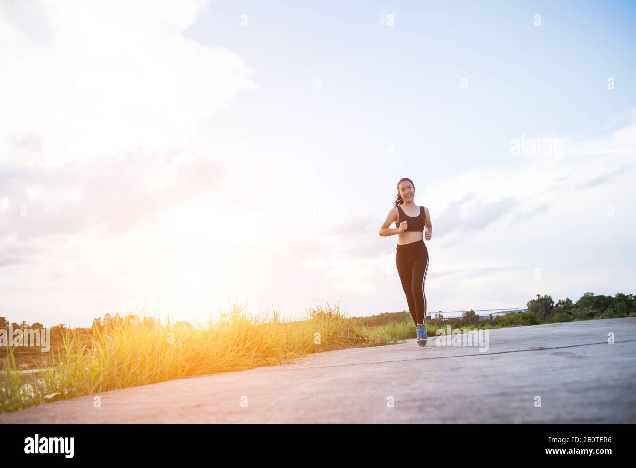 Happy runner outdoors overweight hi-res stock photography and images ...