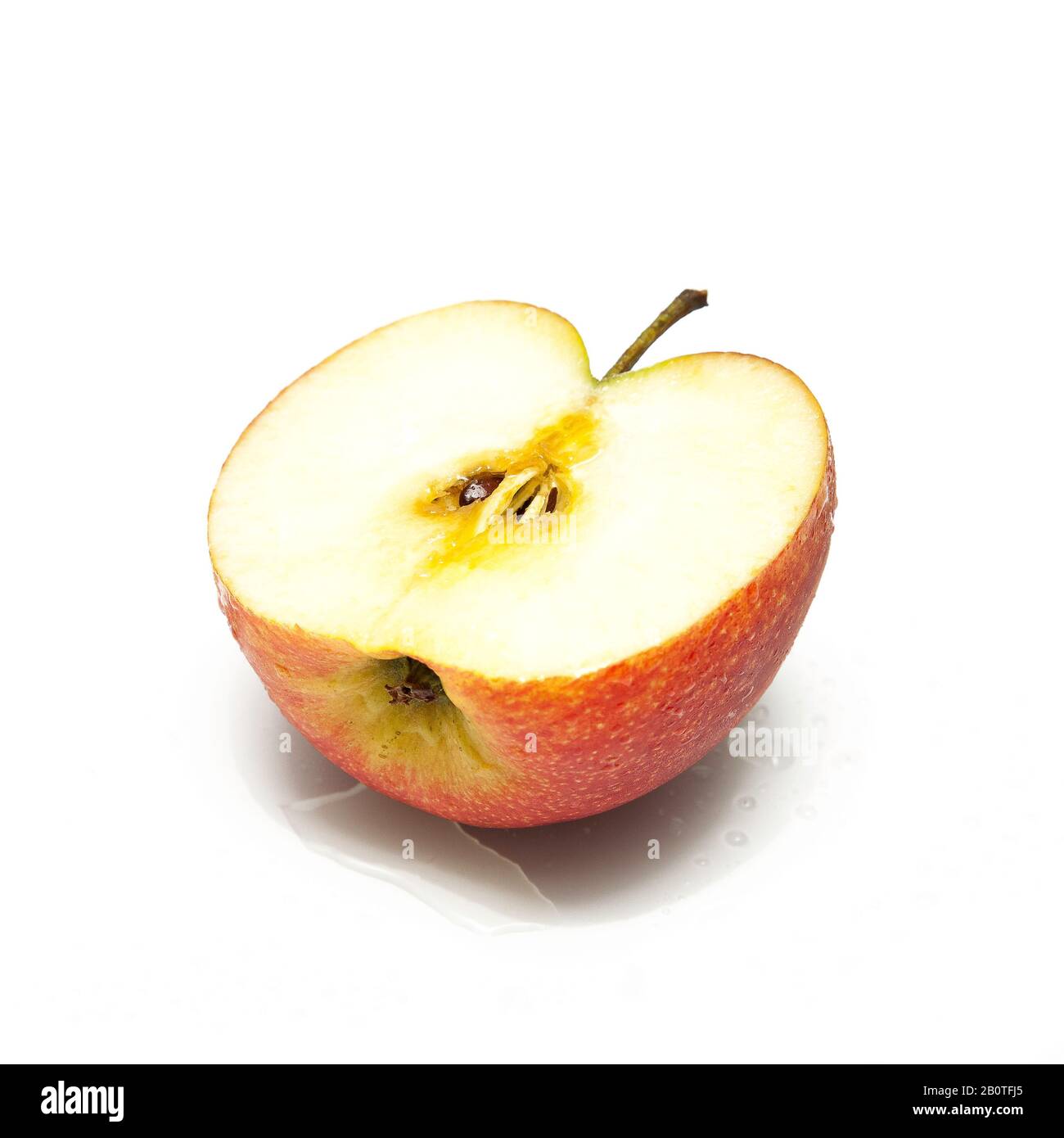 Half an apple on white background Stock Photo - Alamy