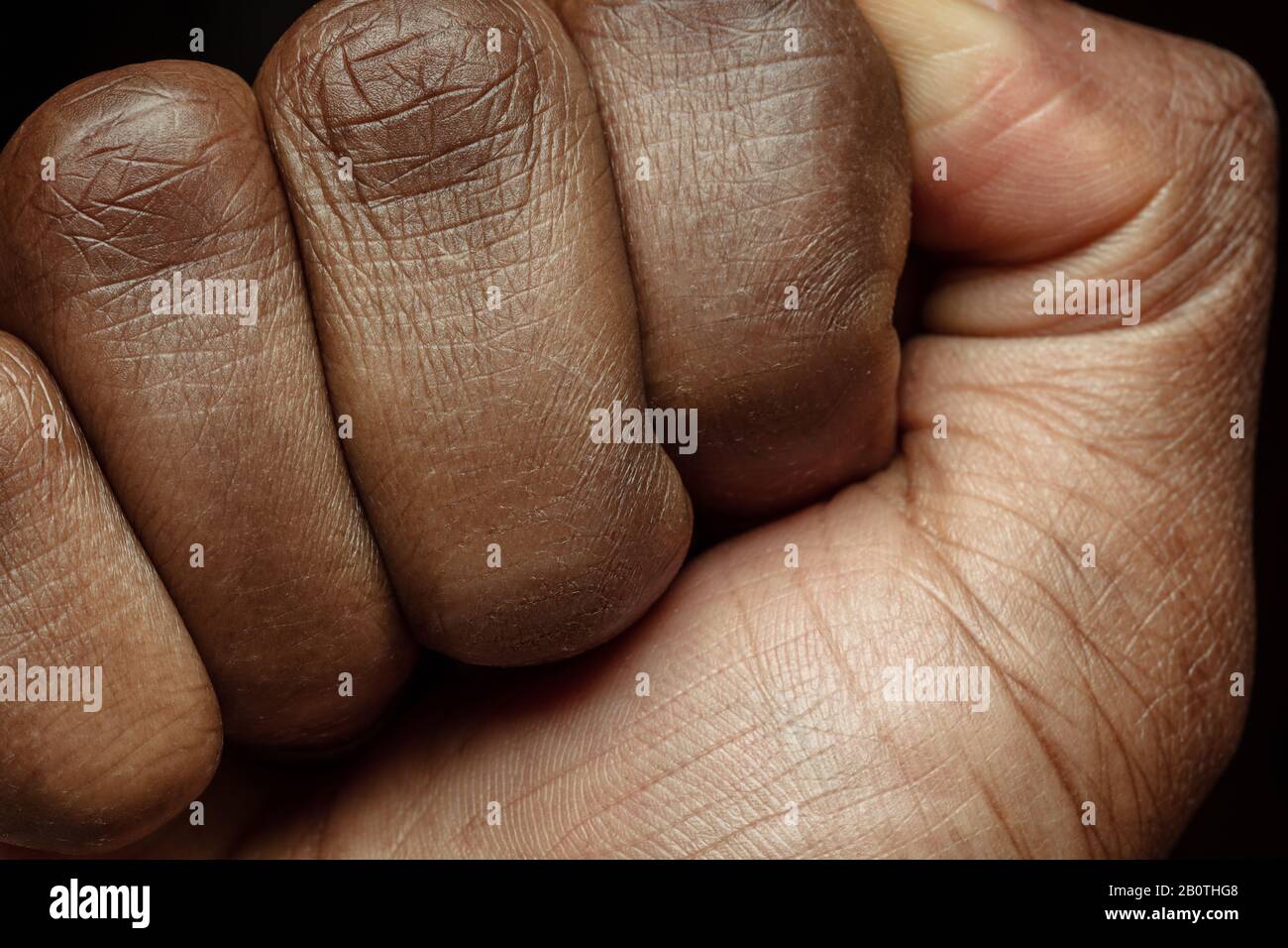 Hand. Detailed texture of human skin. Close up shot of young african ...