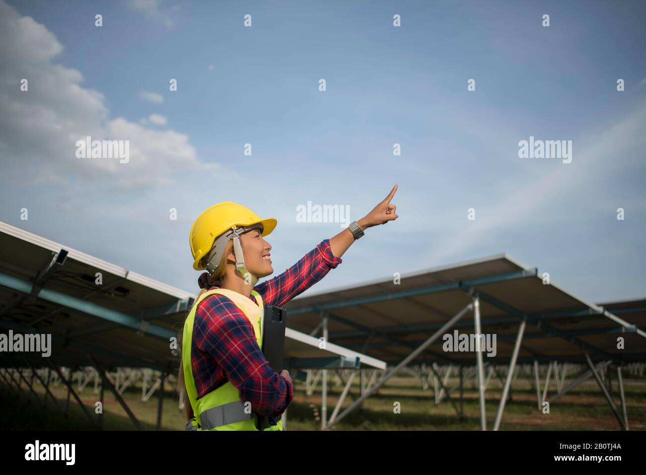 Engineer electric woman checking and maintenance of solar cells Stock ...