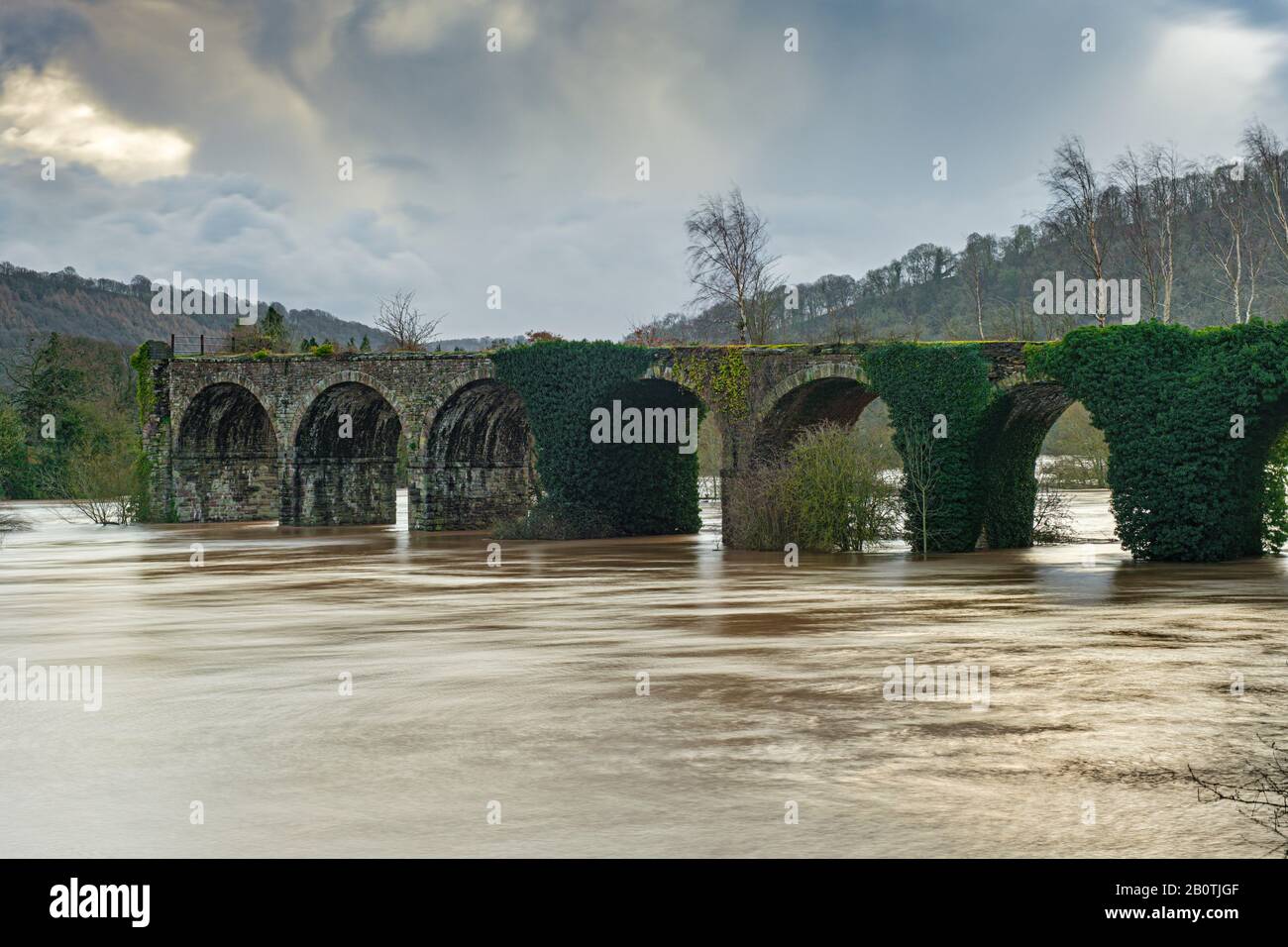 The historic Wye Valley rail viaduct at Monmouth surrounded by flood ...