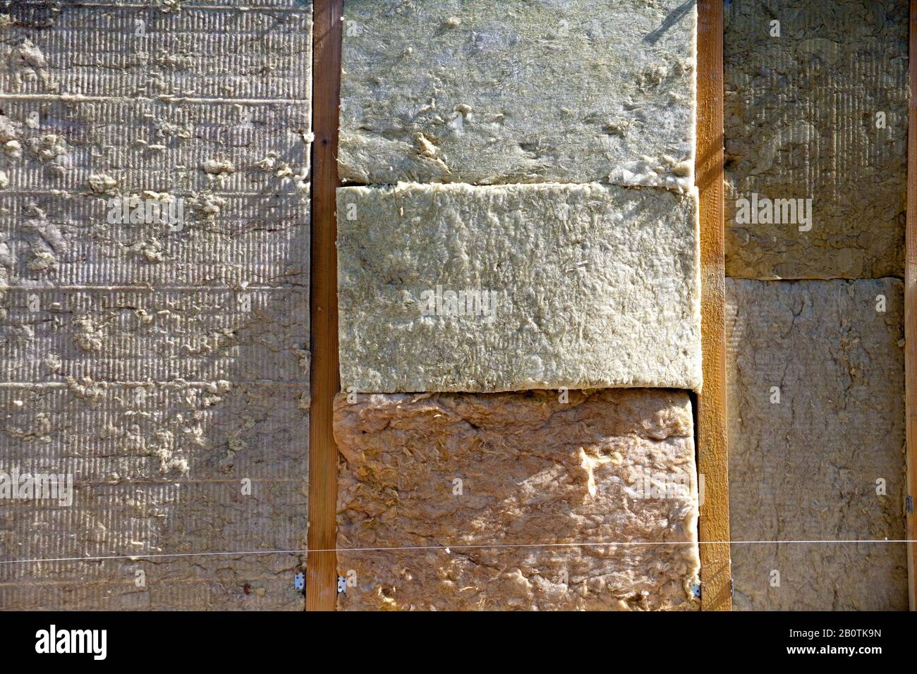 warming the walls of a stone house with a stone wool heater. Ecological ...