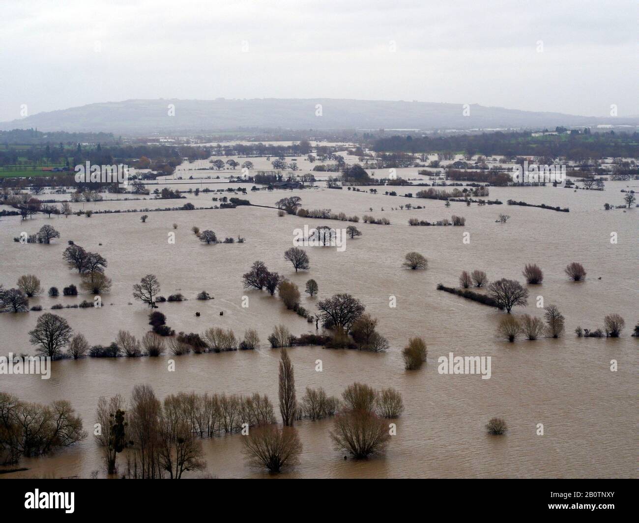 Flood water in Tirley, Gloucestershire, more rain in northern England ...