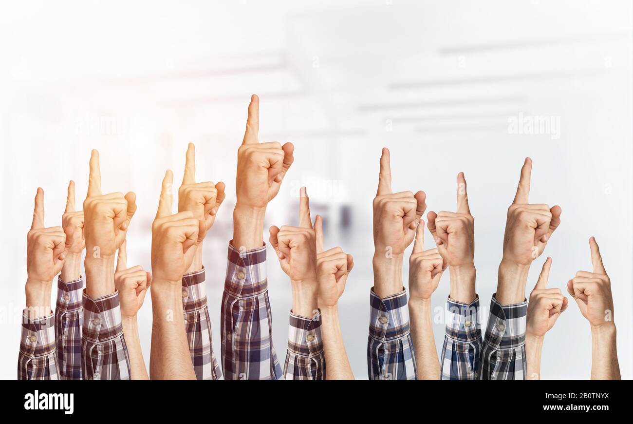 Row of man hands showing finger pointing gesture Stock Photo - Alamy
