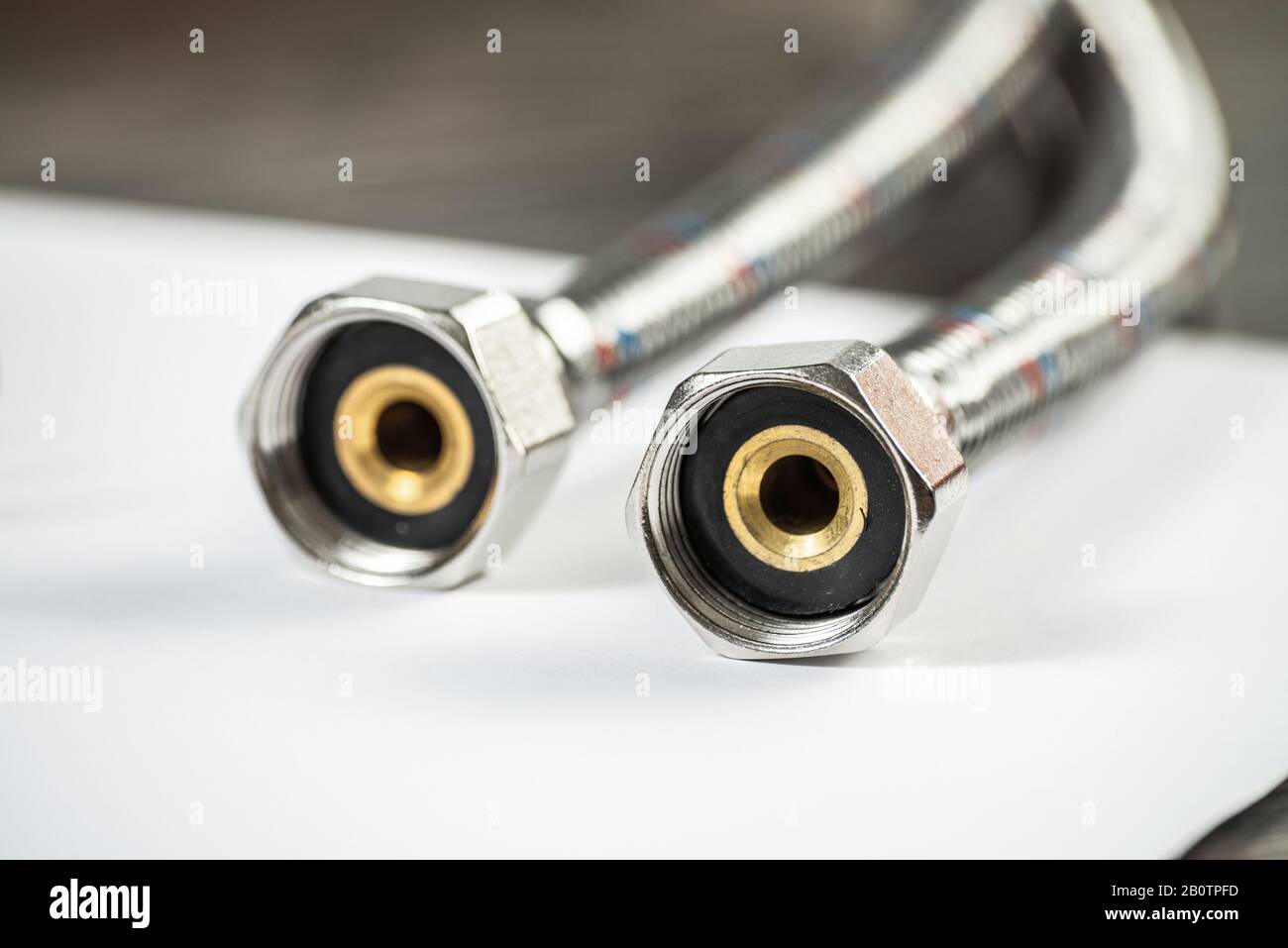 Water braided hose with connecting internal screw Stock Photo - Alamy