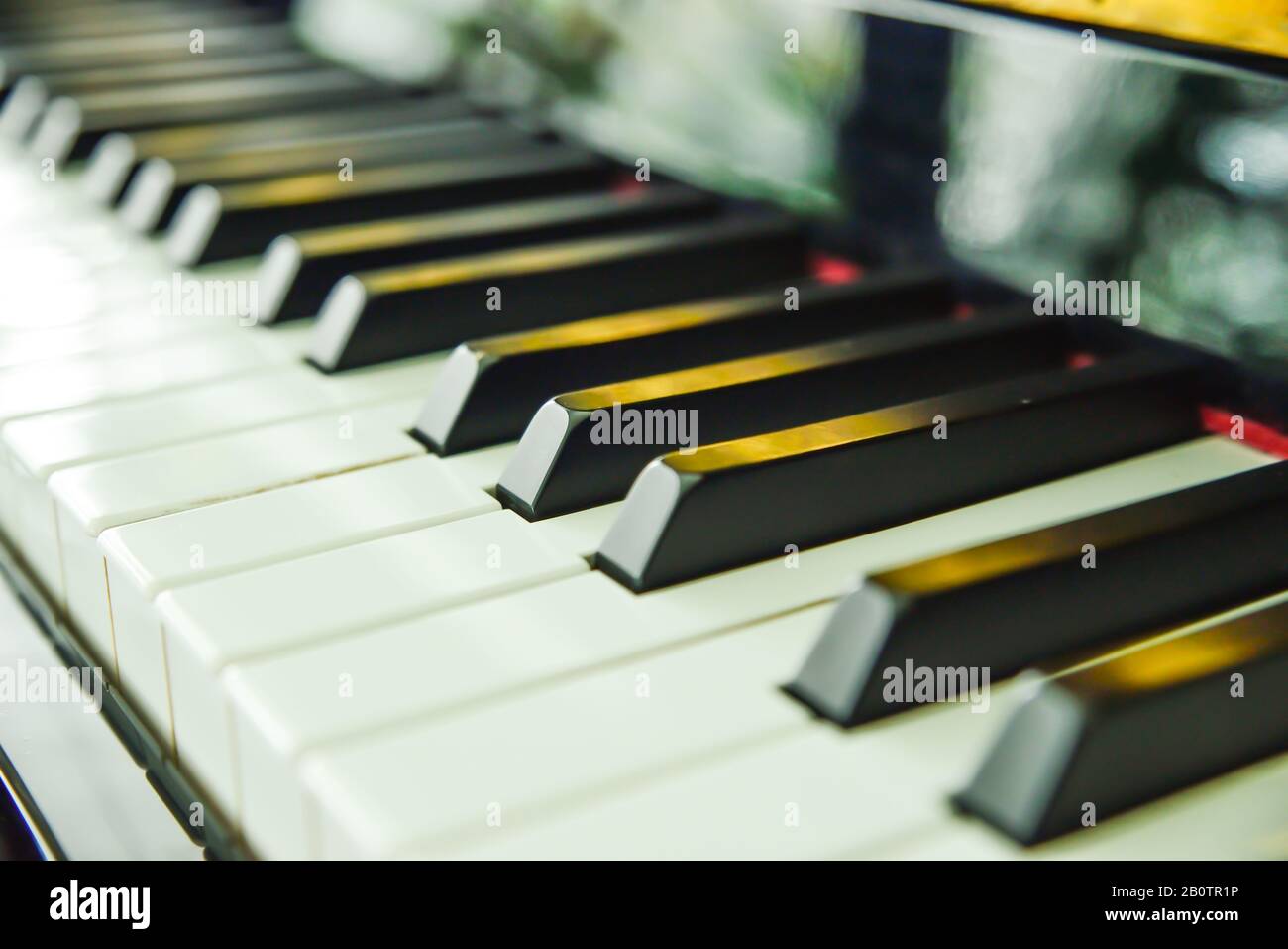 Black and white keys of a piano Stock Photo - Alamy