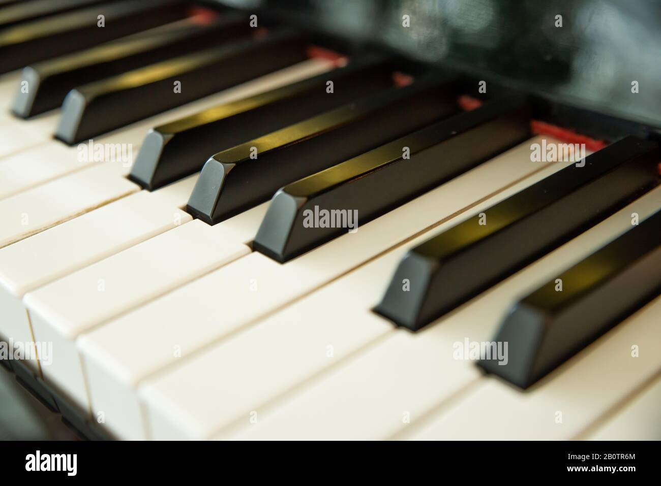 Black and white keys of a piano Stock Photo - Alamy