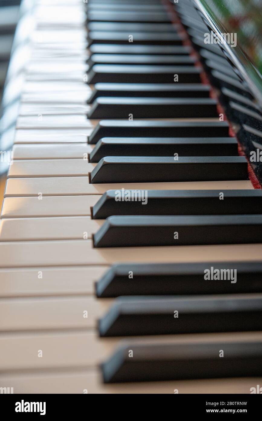 Black and white keys of a piano Stock Photo - Alamy