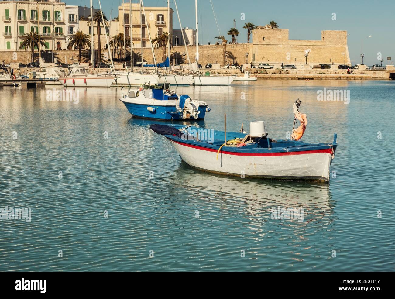 Old fishing boats in Bari, Italy Stock Photo - Alamy