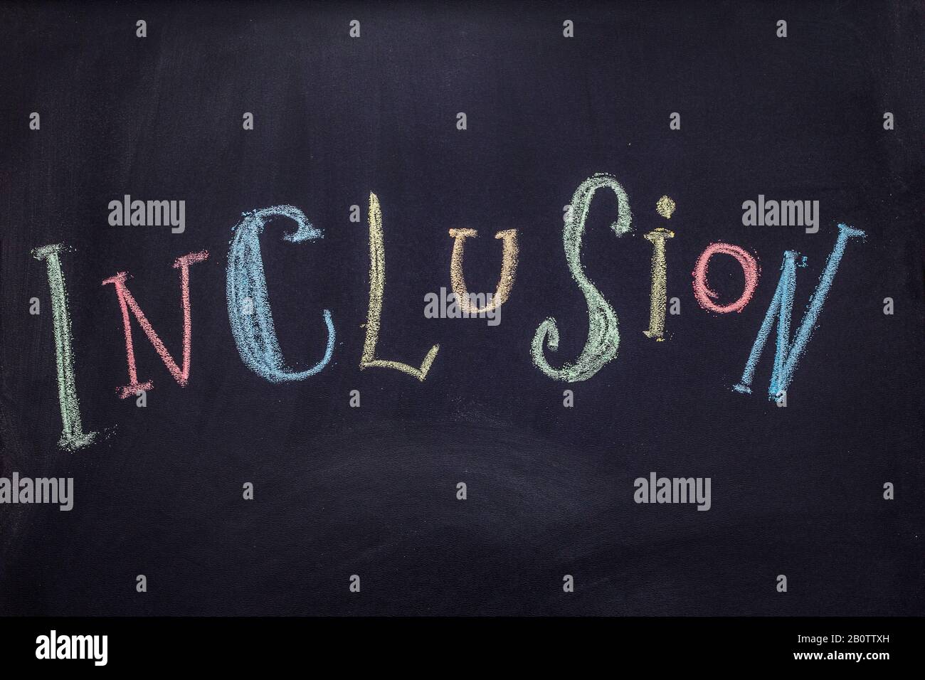 Word Inclusion on black school blackboard written with chalk. Education ...