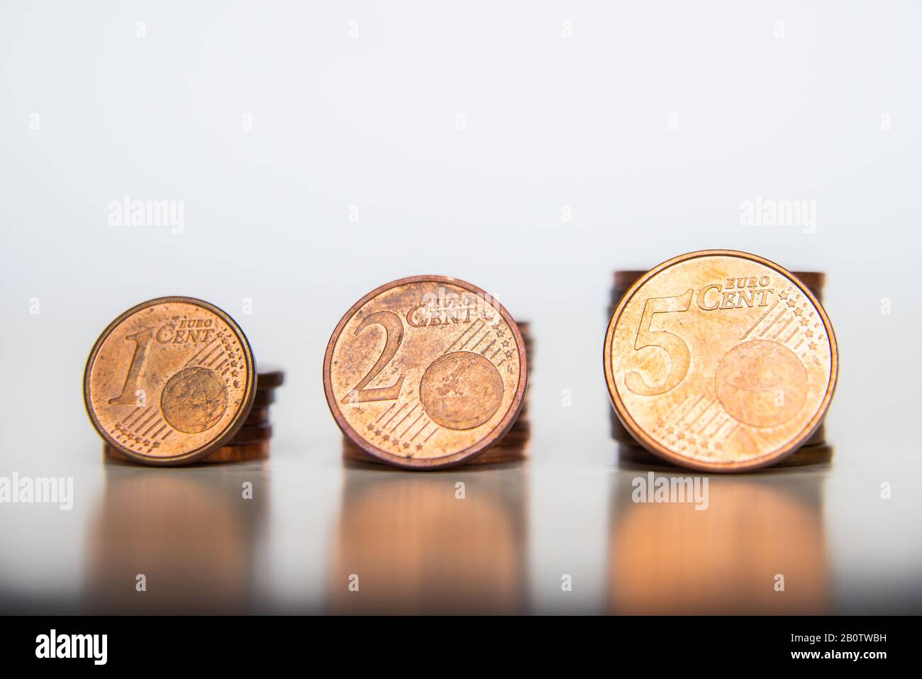 Euro coins on white background Stock Photo - Alamy