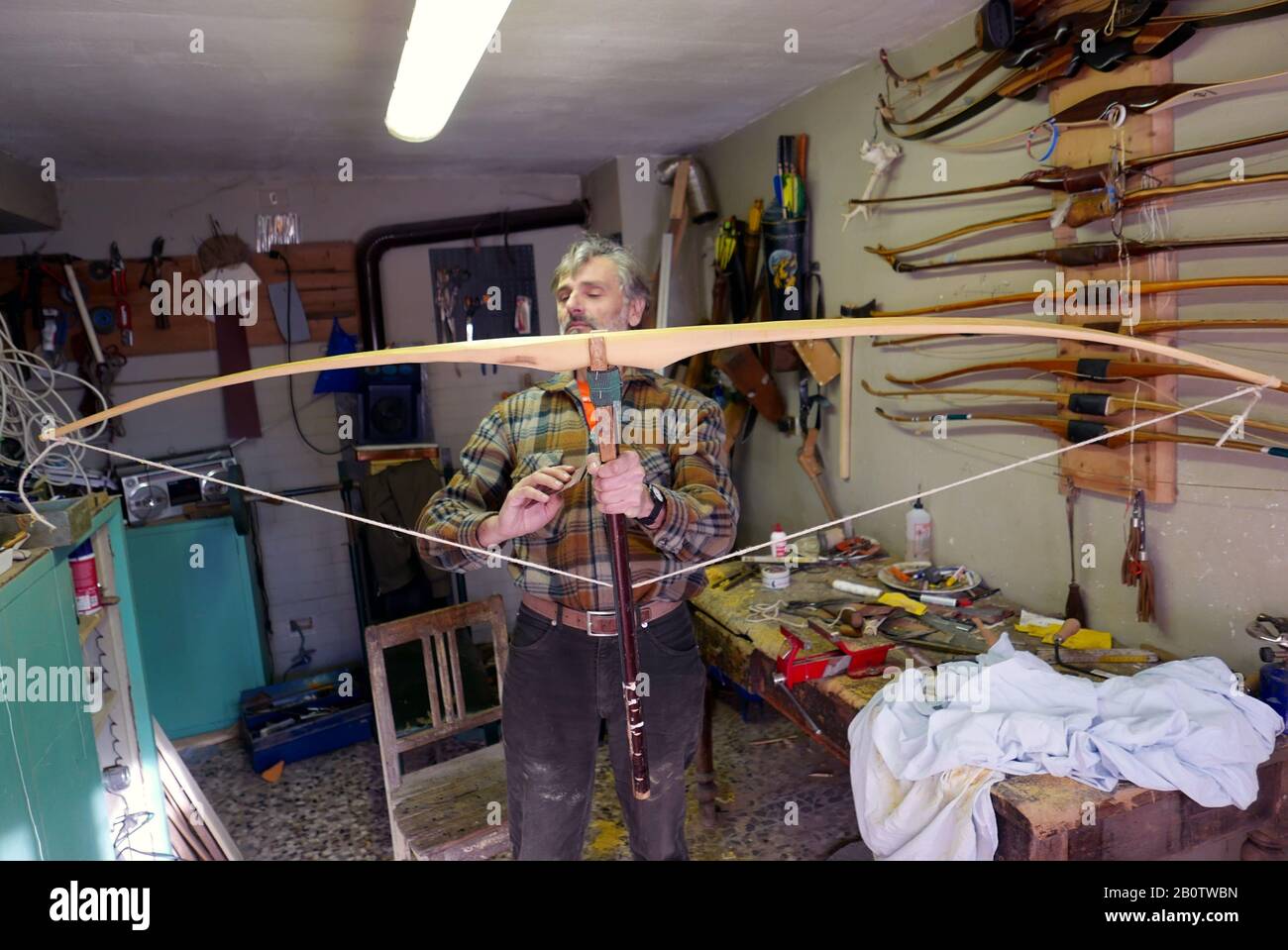 artesan at work making a traditional bow Stock Photo - Alamy