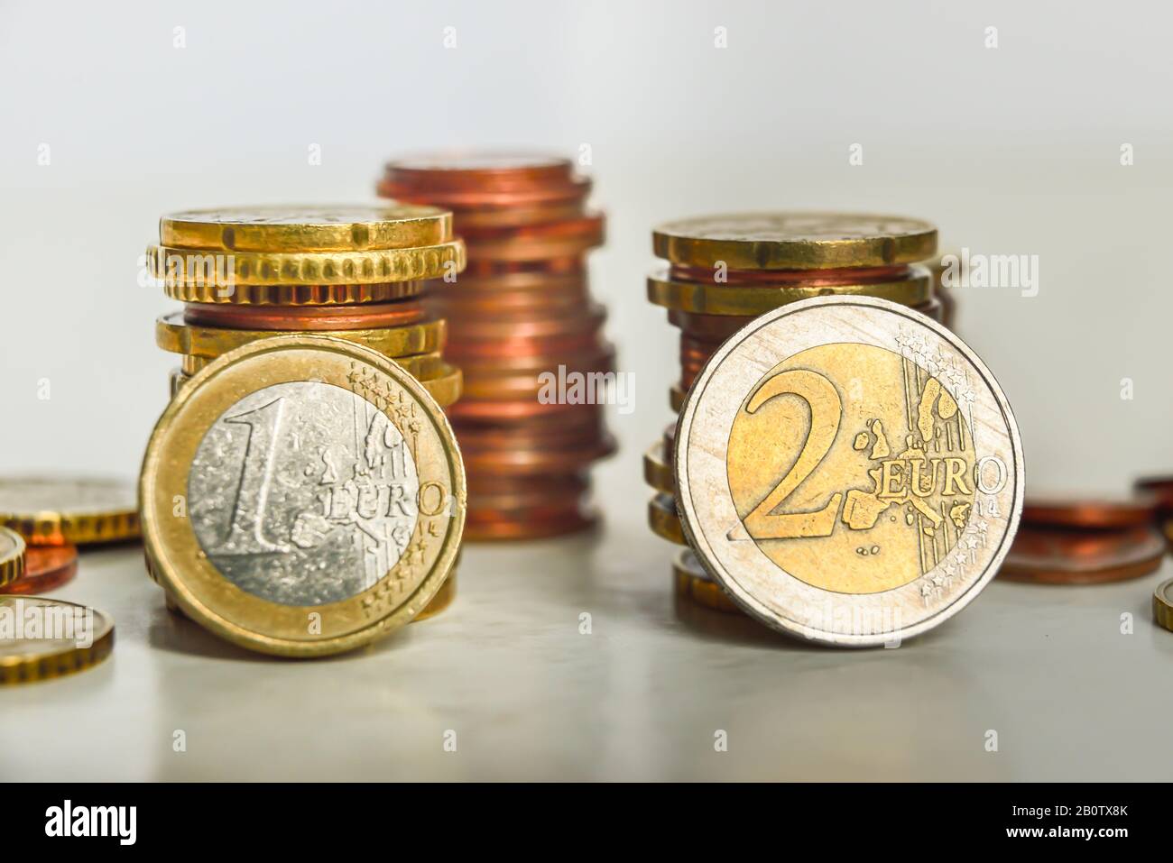 Euro coins on white background Stock Photo - Alamy