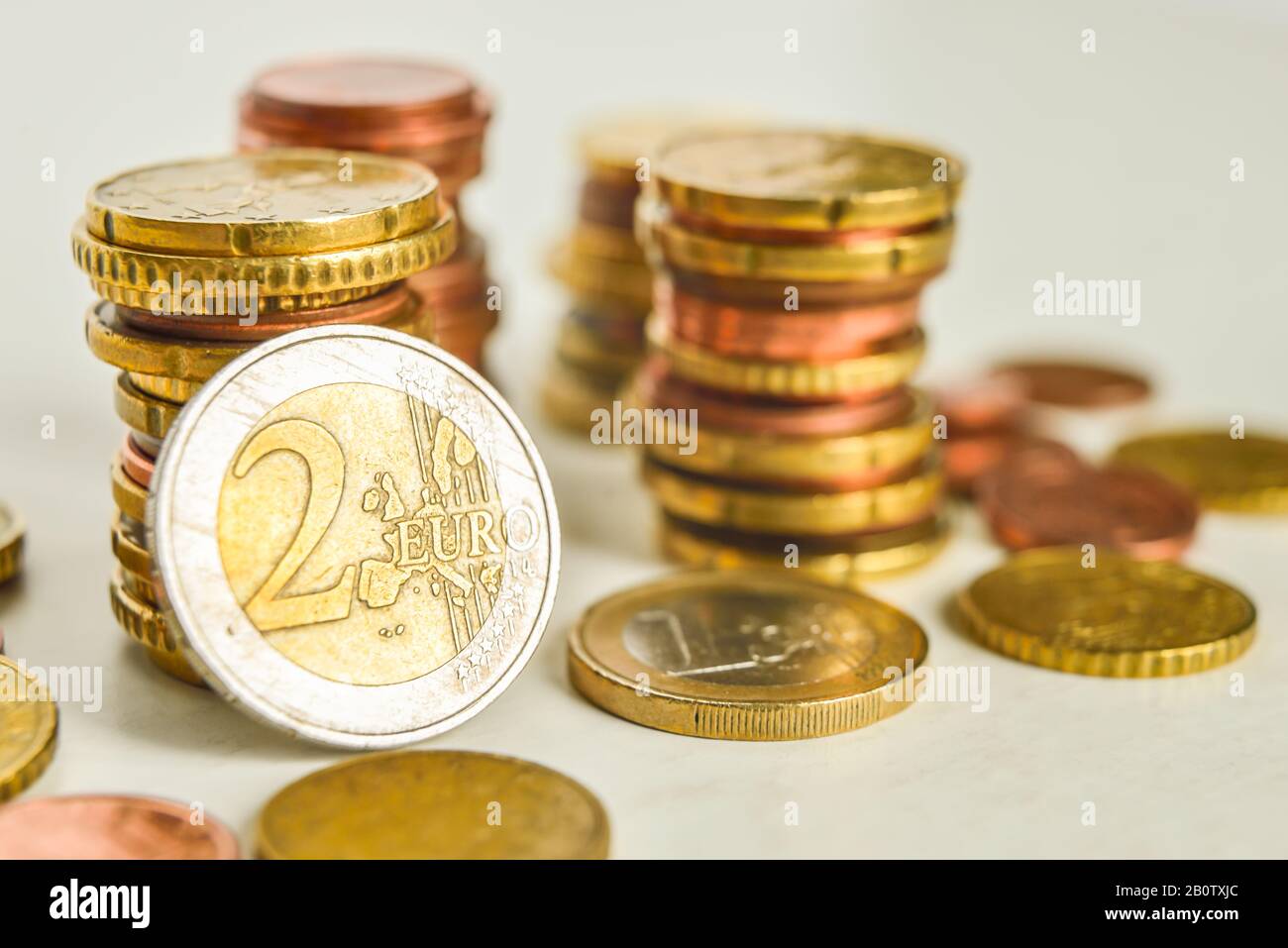 Euro coins on white background Stock Photo - Alamy