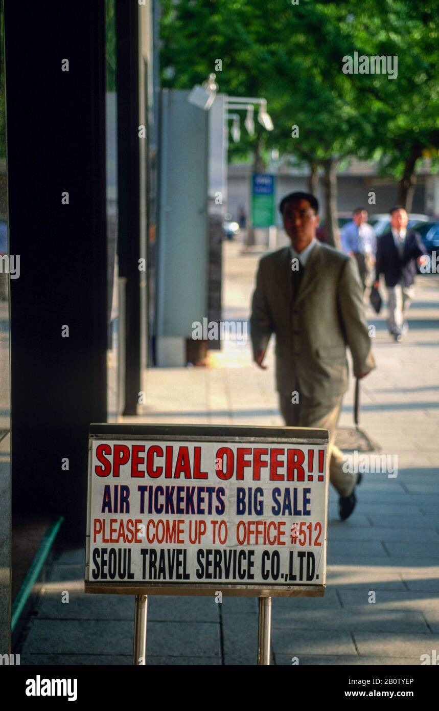 Cut price air tickets on sale during the 1997 IMF Asian financial ...