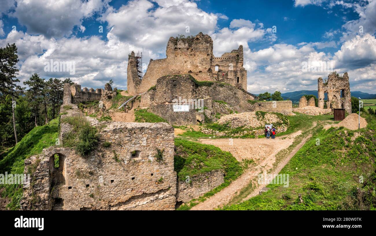 Medieval castle ruins on hill over village of Divin, Banska Bystrica ...