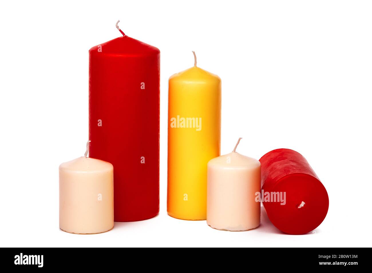 different size and colors candles isolated on a white background Stock ...
