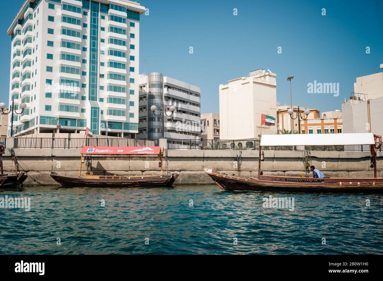 DUBAI, UAE - MARCH 7: Boats Abra ferries cruise business on the Bay ...