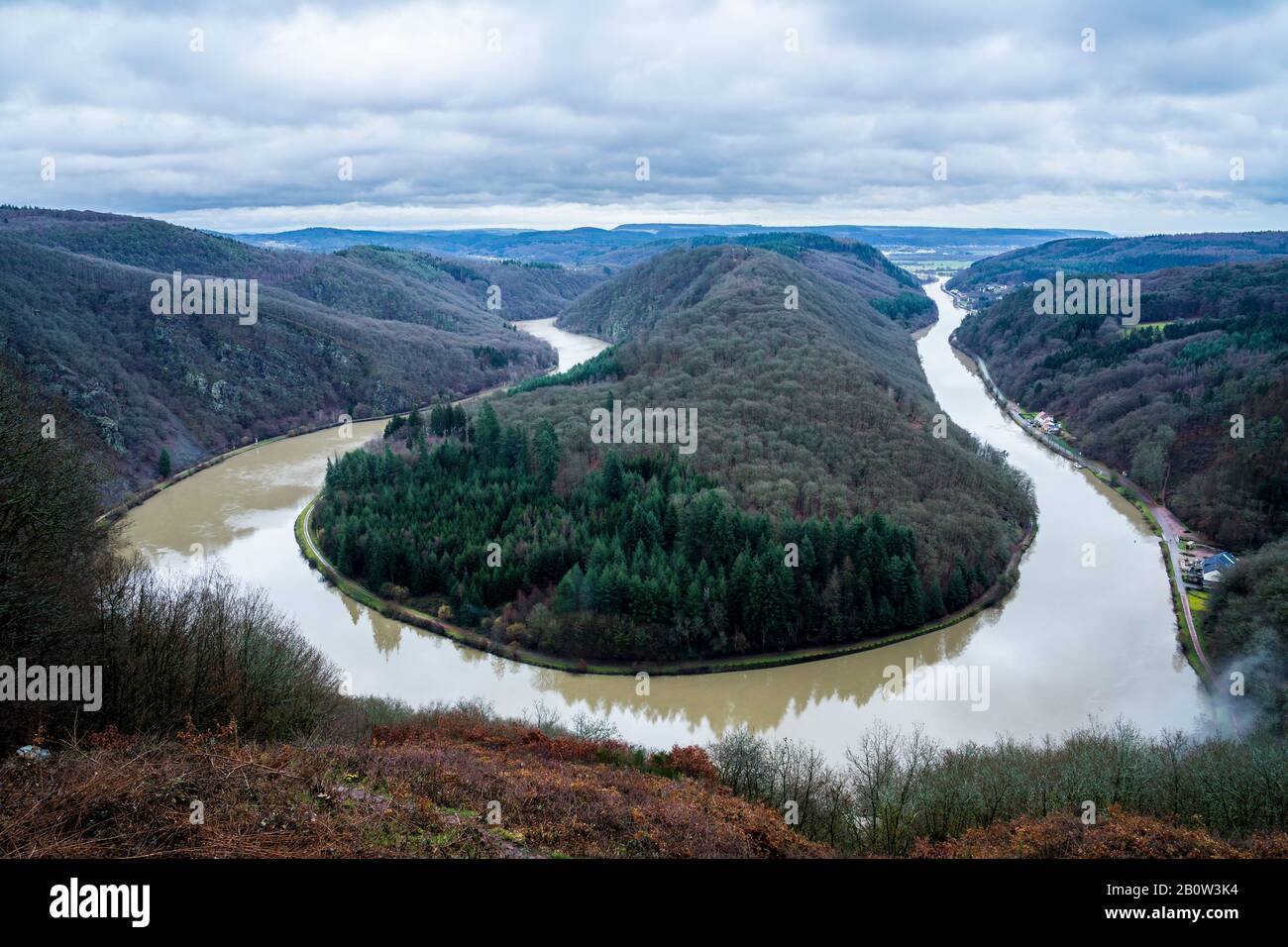 Germany, Mettlach, Slow moving clouds above world famous german river ...