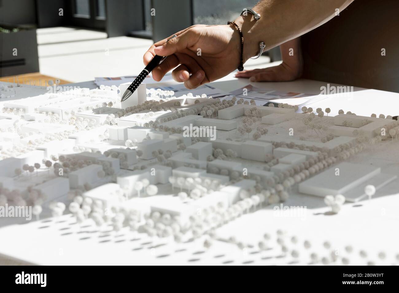 Architect pointing model hi-res stock photography and images - Alamy