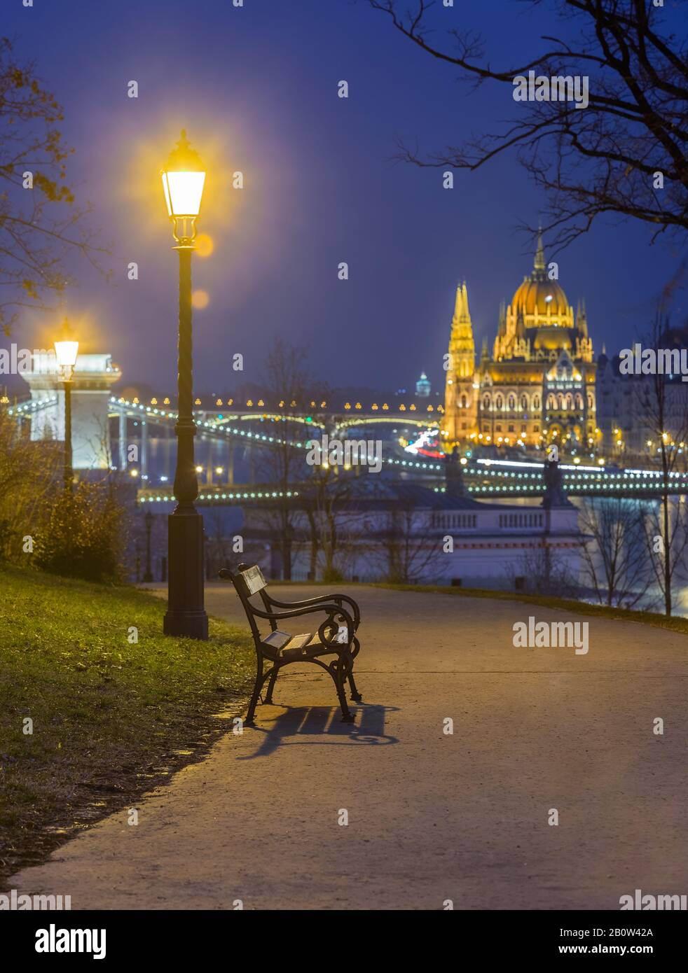 Budapest, Hungary - Bench and lamp post in a park at Buda district with ...