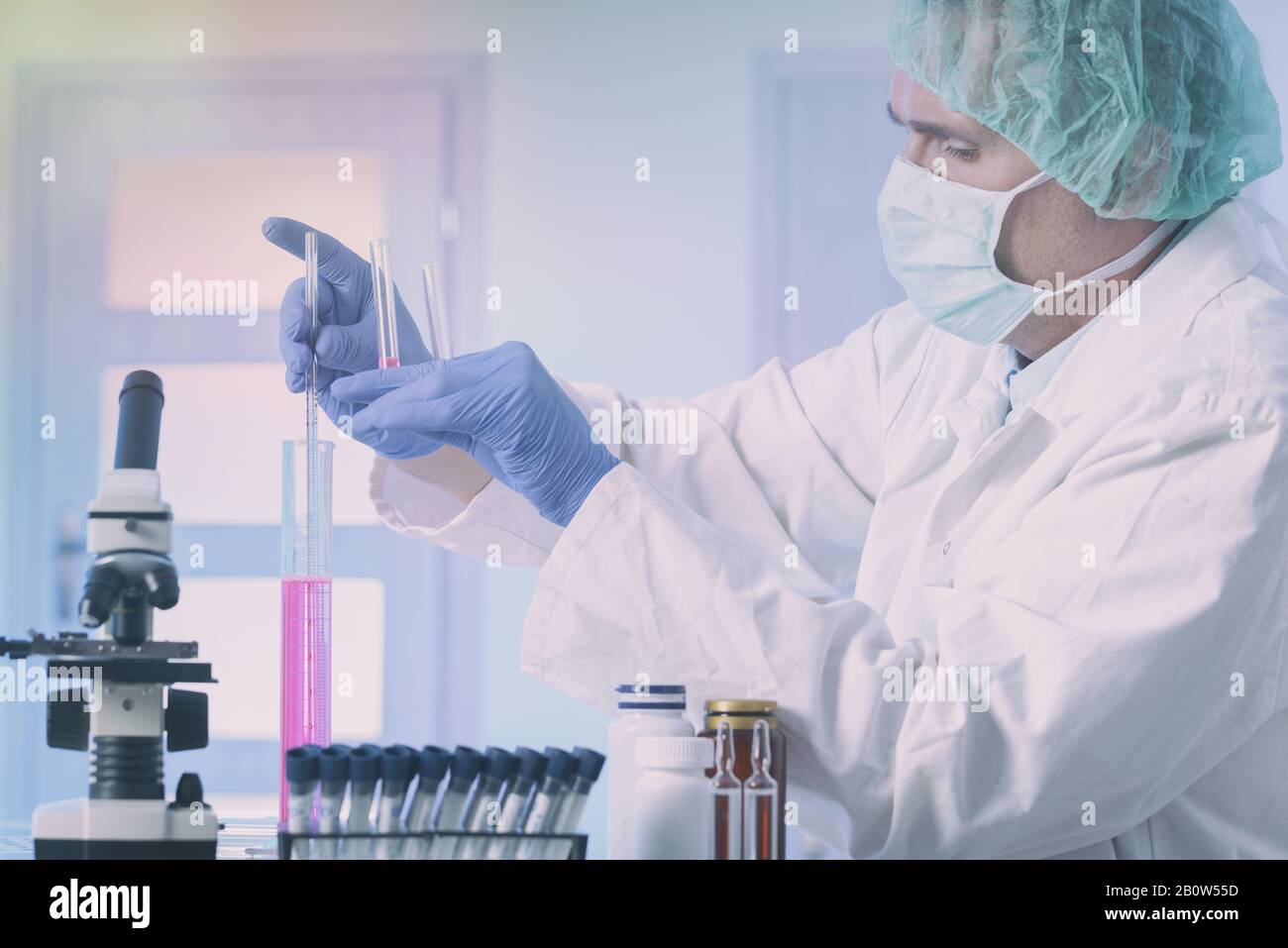 Scientist doing medical experiments at the laboratory Stock Photo - Alamy