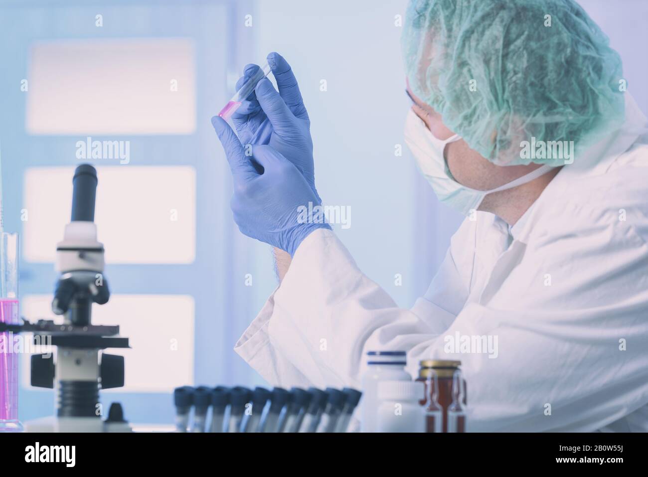 Scientist doing medical experiments at the laboratory Stock Photo - Alamy