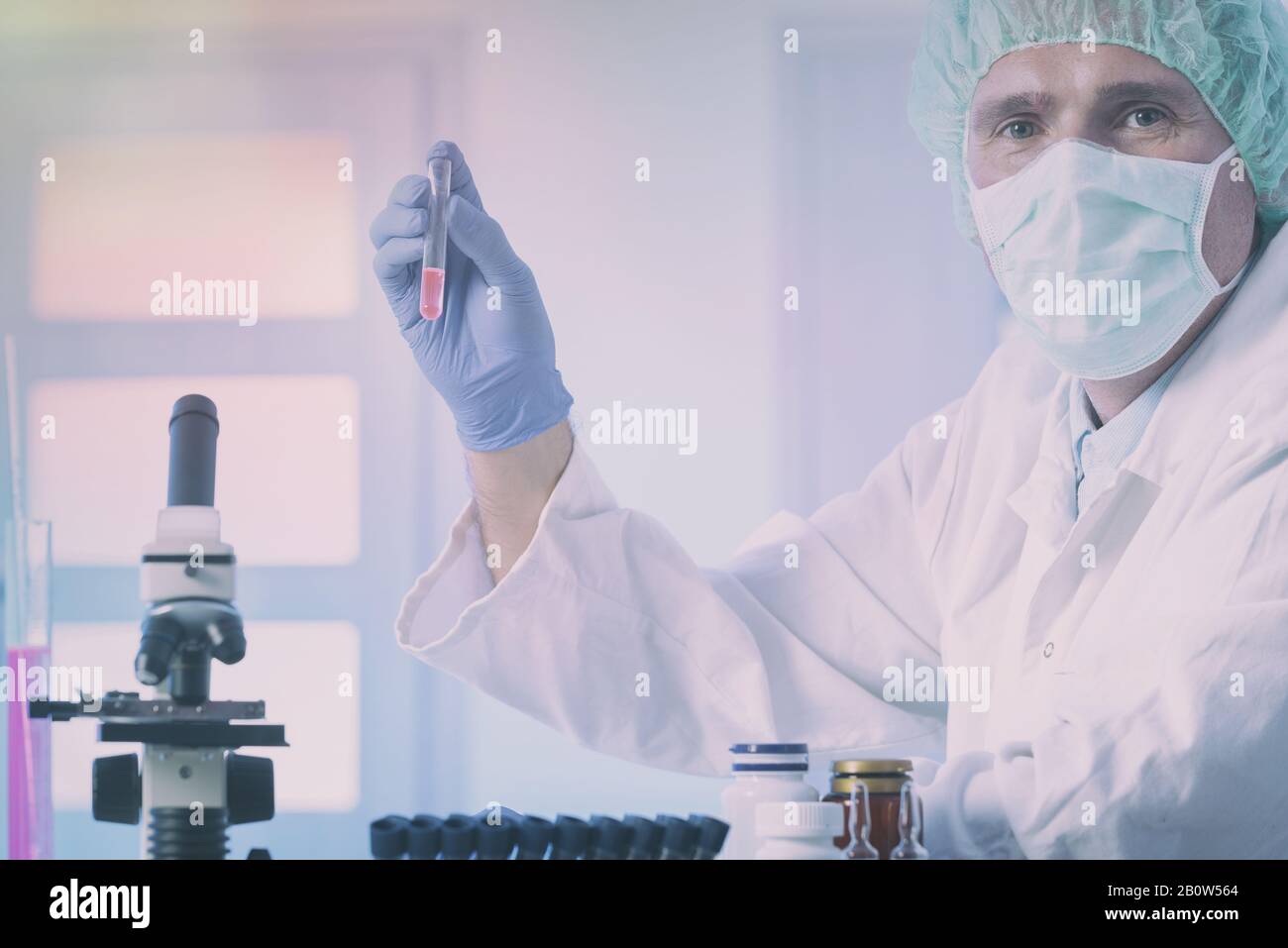 Scientist doing medical experiments at the laboratory Stock Photo - Alamy