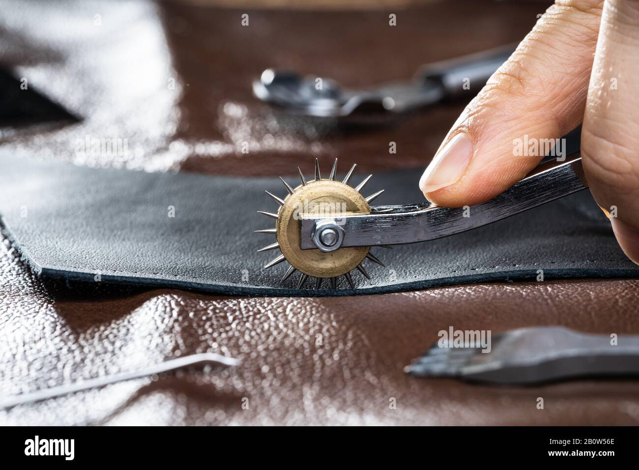 Cobbler Working With Leather. Leather Craft Tools Stock Photo - Alamy