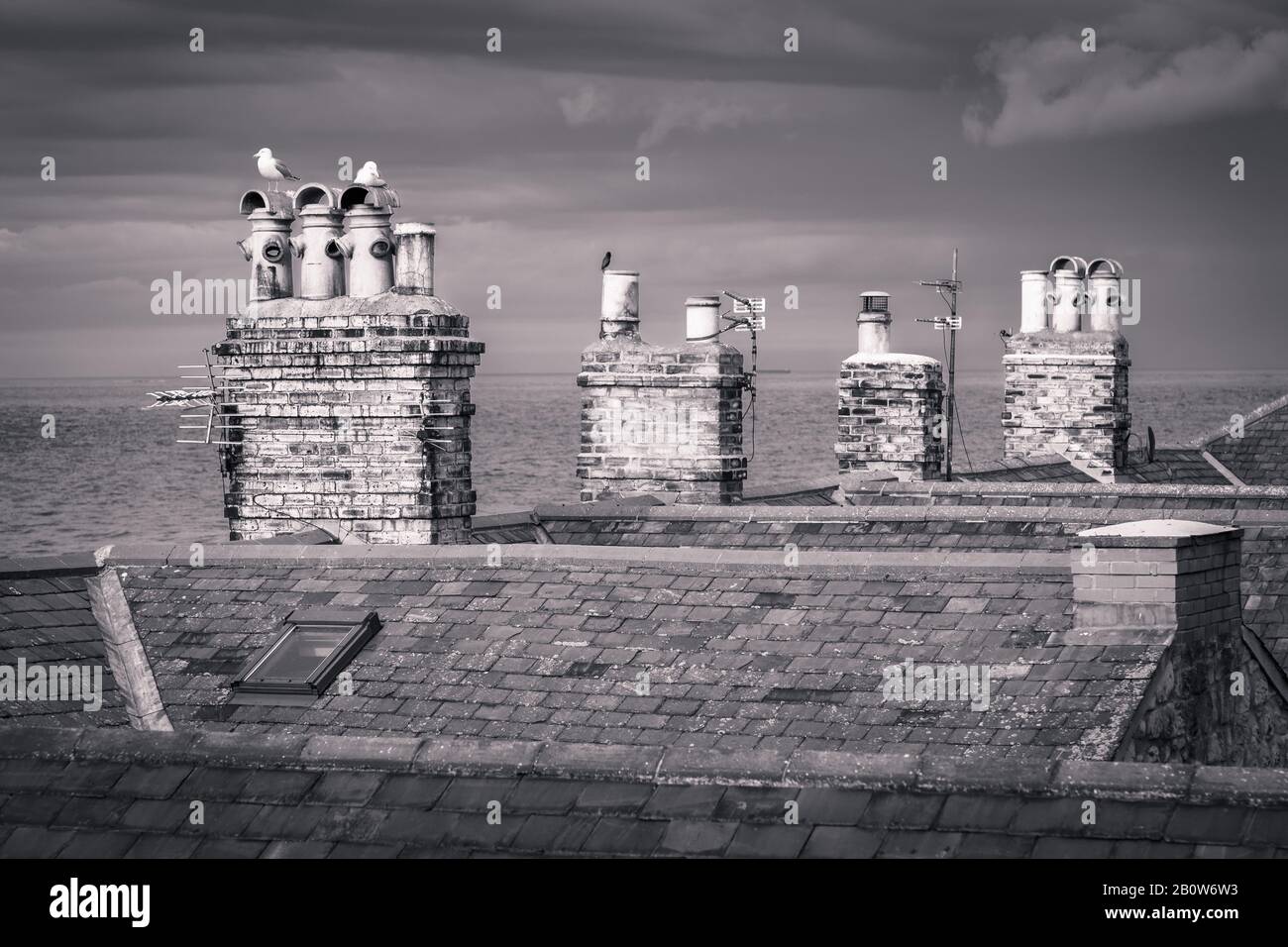 Traditional brick chimney stacks, seaside town of Seahouses Stock Photo ...