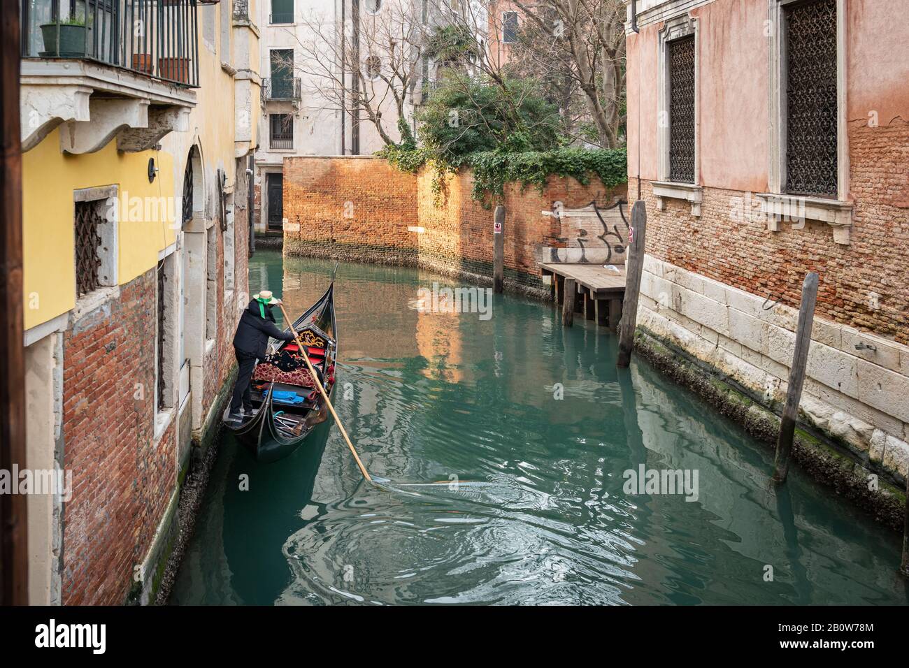 Canal with gondola in Venice (Italy) in winter Stock Photo - Alamy