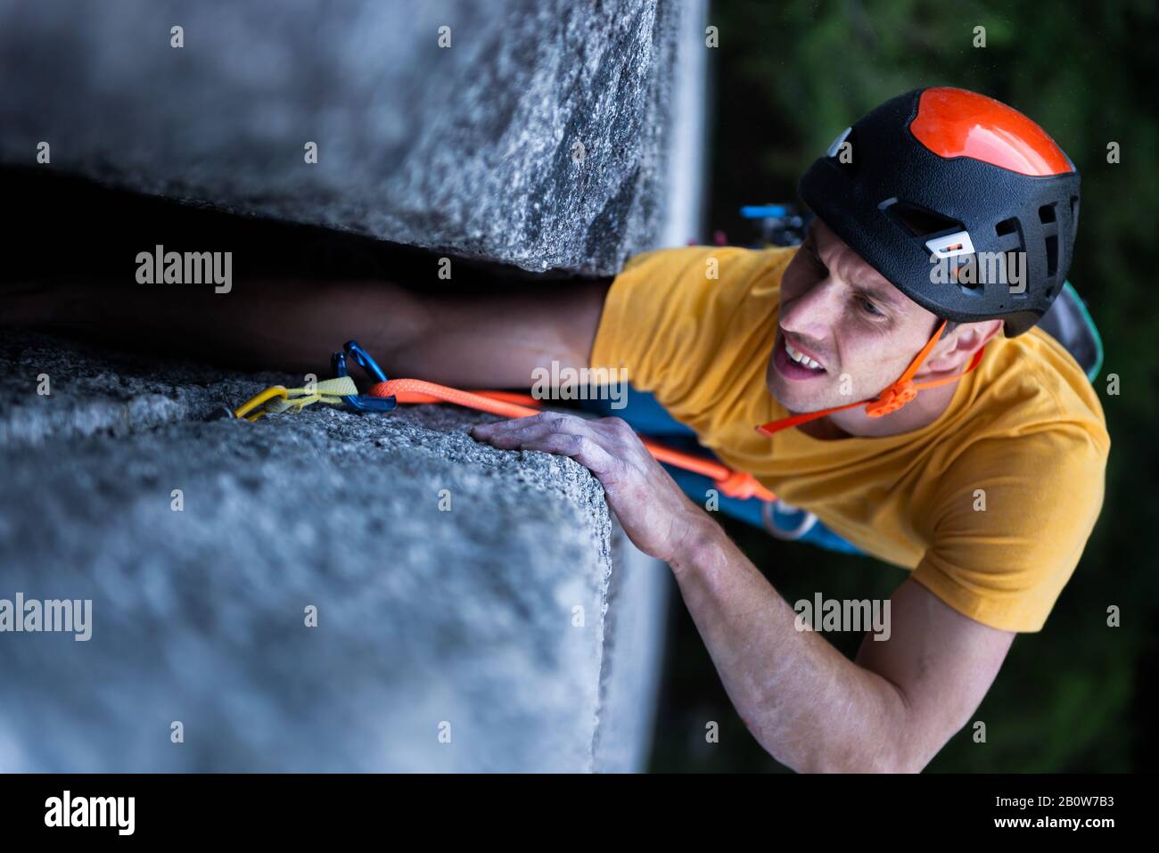A climber traditional climbing on granite, Tantalus Wall, Squamish ...