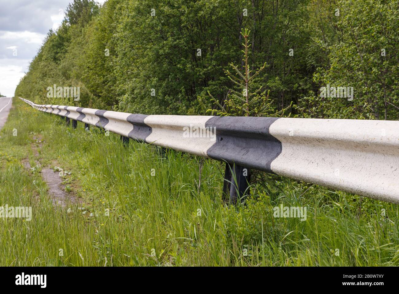 metal road fencing of barrier type, close-up. Road and traffic safety ...