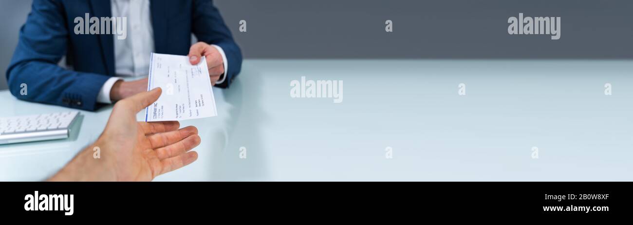 Handing a cheque hi-res stock photography and images - Alamy