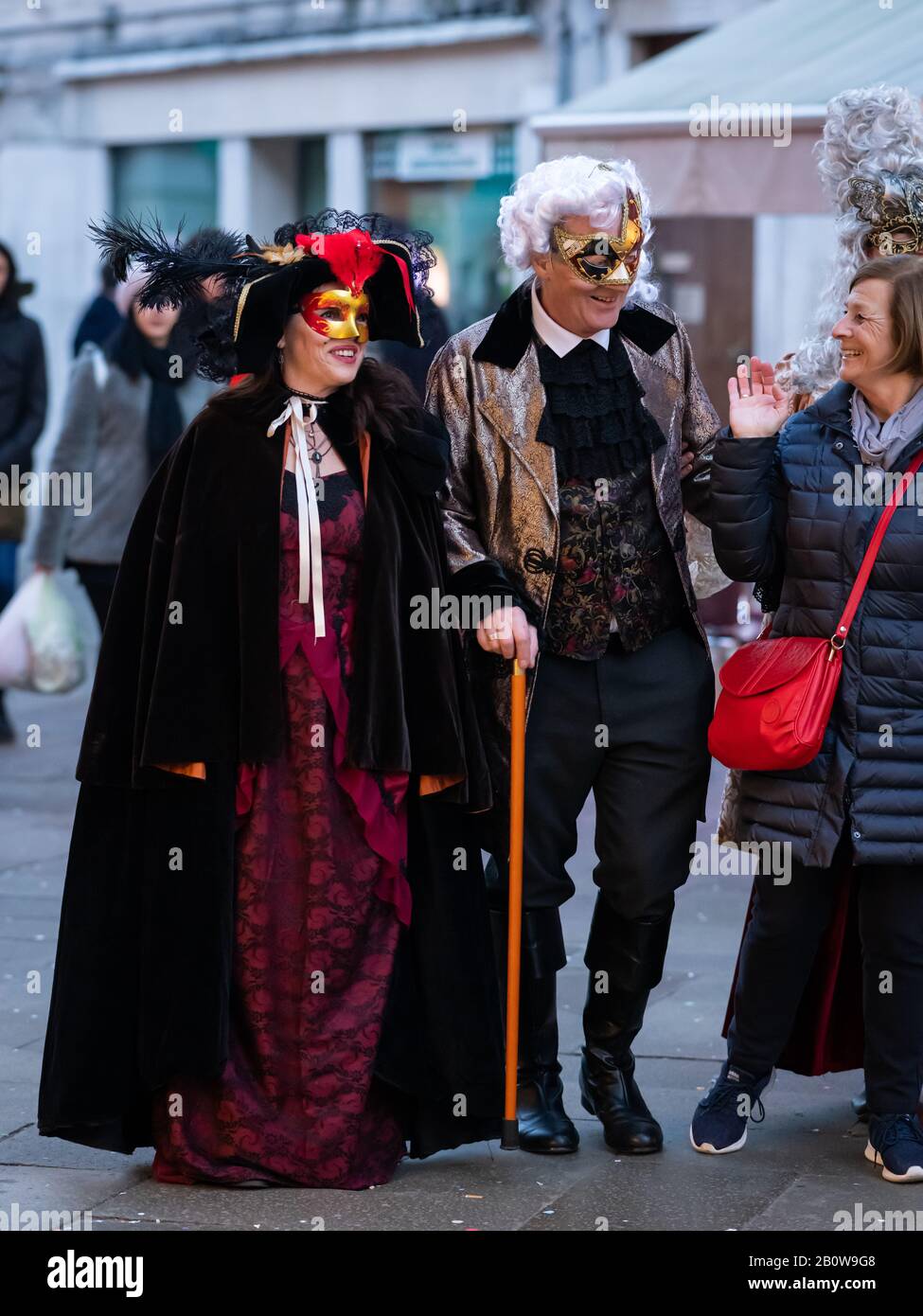 People in carnival disguise in February in Venice (Italy Stock Photo ...