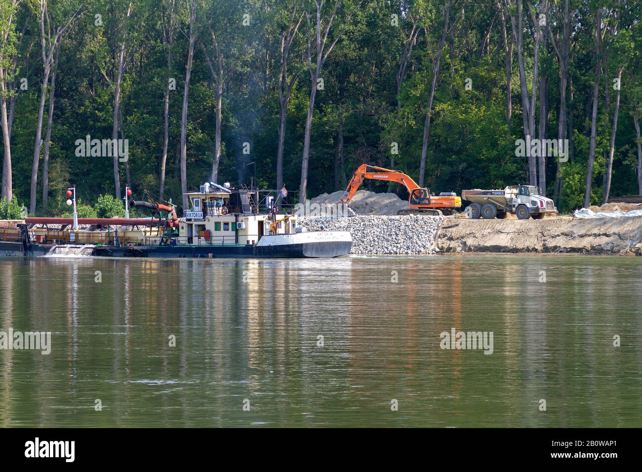 Construction of the riprap embankment on the Drava River Stock Photo ...