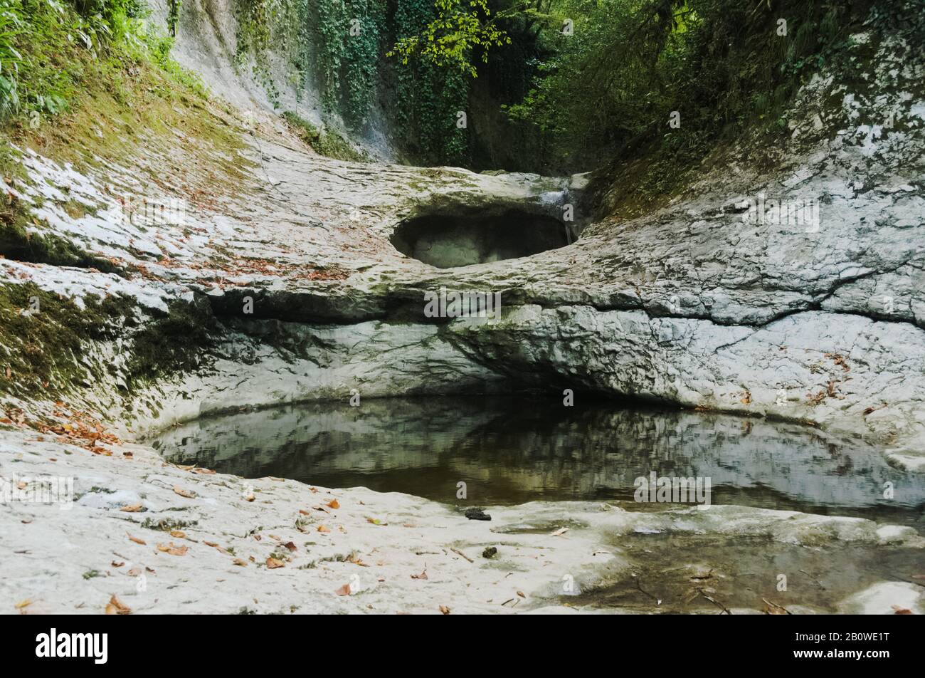 The hole and deep cavity with fresh water Stock Photo - Alamy