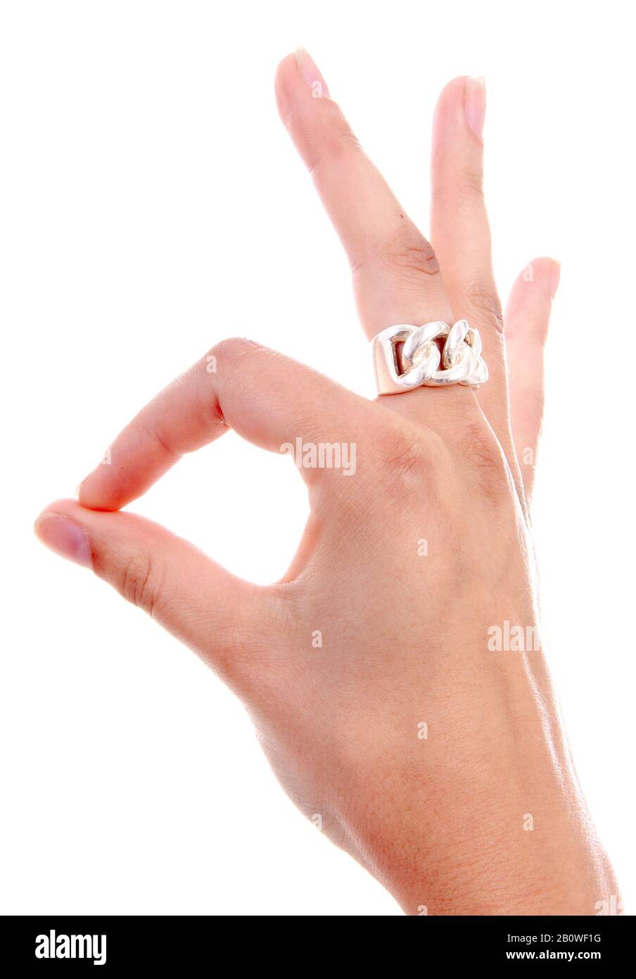 Woman hand is making okay sign with fingers over white background Stock ...