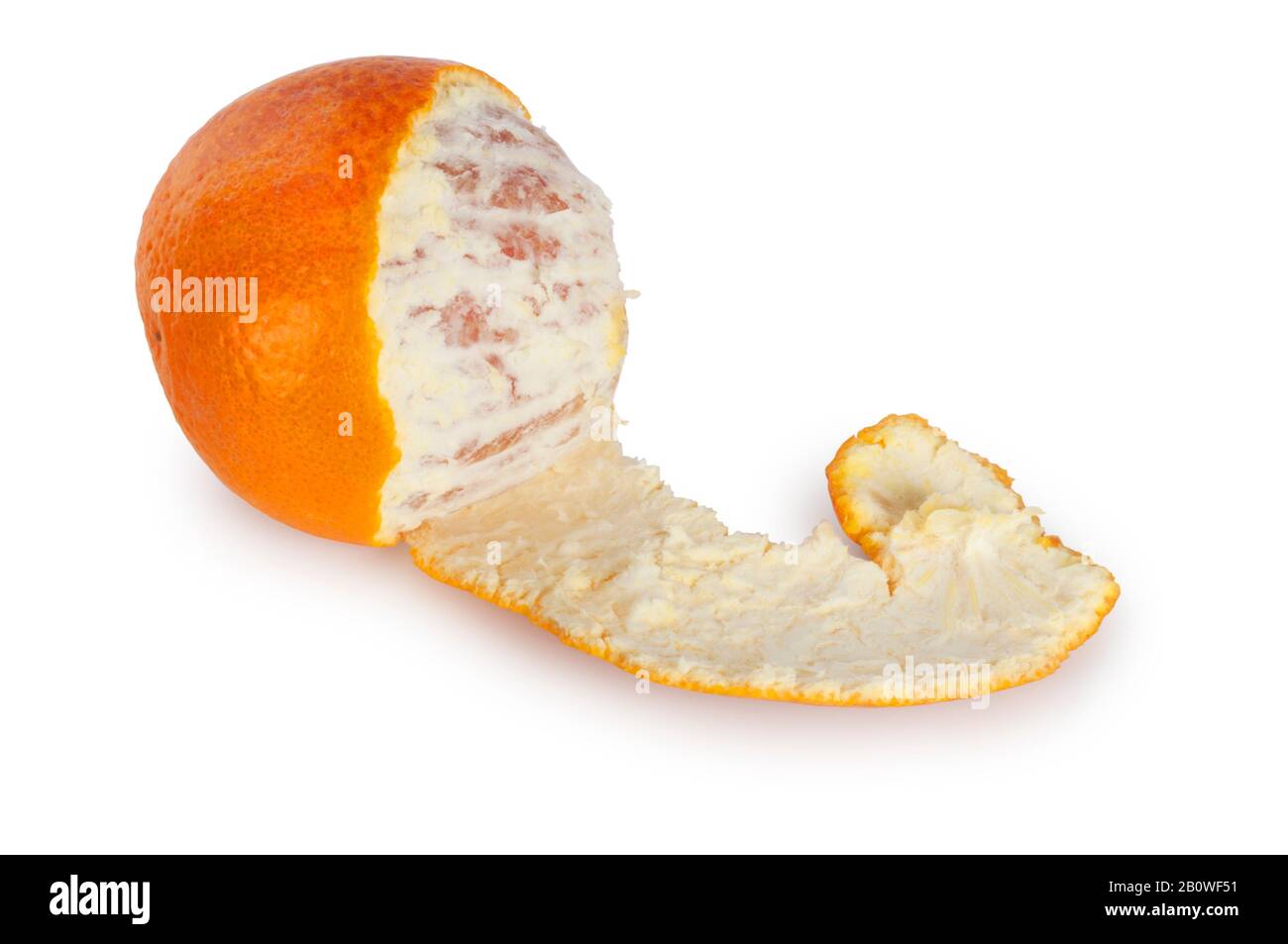 Studio shot of an orange in the process of being peeled cut out against ...